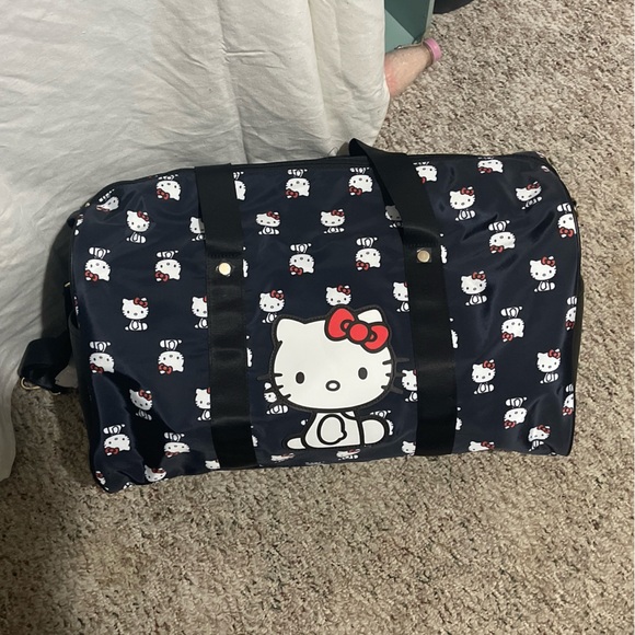 Sanrio | Bags | Hello Kitty Sanrio Black All Over Logo Black Duffel ...